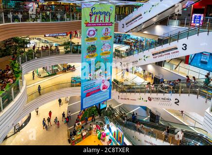 People at the AEON mall Binh Tan, top view. AEON mall shopping complex ...