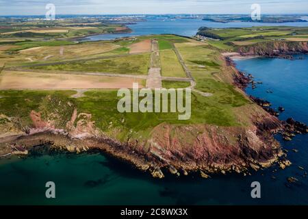 Aerial view of an old, abandoned ww2 airfield and runway (RNAS Dale ...