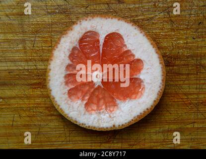 Cross section of a pink grapefruit in black and white Stock Photo - Alamy