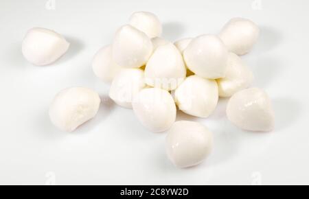 Baby mozzarella isolated on white background. Group of bocconcini ...