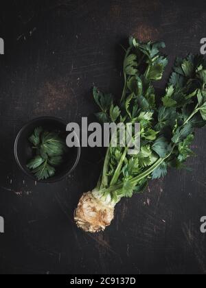 Bowl of fresh cut celery on grunge background Stock Photo - Alamy