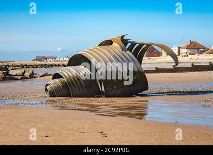 Mary's Shell sculpture on Cleveleys beach at low tide with father and ...