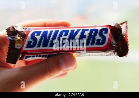 Snickers is a brand name chocolate bar made by the American company ...