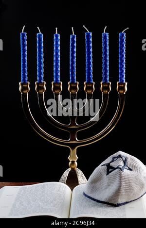 Open Torah and the menorah or seven-lamp Hebrew lampstand, symbol of ...