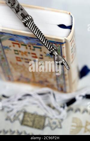 Sylver yad, black and white tzitzit, tallit, kippah and Torah. Jewish ...