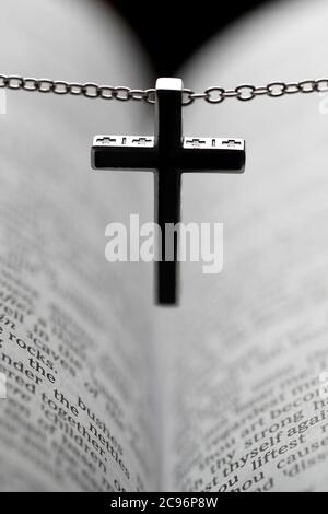 Christian cross over a bible. France Stock Photo - Alamy