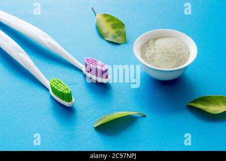 Herbal organic tooth powder with toothbrush close up Stock Photo - Alamy
