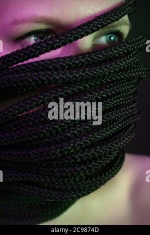 portrait of sexy woman with rope wrapped around her neck Stock Photo ...