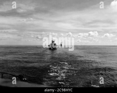 The U.S. Navy attack cargo ship USS Arneb (AKA-56) in Antarctica during ...