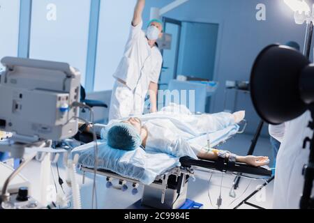 Female anesthesiologist at work in operating room in Florida hospital ...