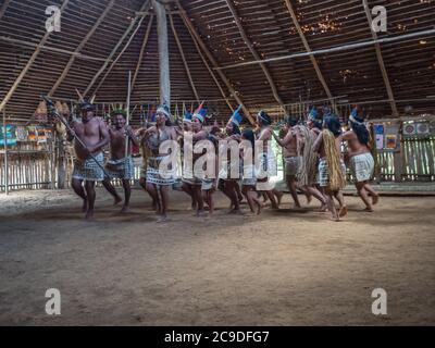 Iquitos, Peru- December 11 2019: Indian from Bora tribe in his local ...