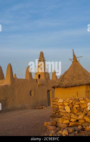 Mudbrick granaries and a mosque in the Djiguibombo Dogon village in the ...