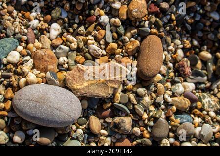New Polzeath Cornwall - colorful stones on the beach Stock Photo - Alamy