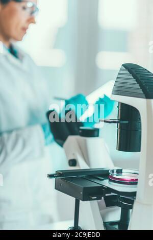 Life sciences, researcher taking observation notes Stock Photo - Alamy