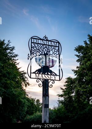 Village sign of Dunham Massey with Coat of Arms at Dunham Town ...
