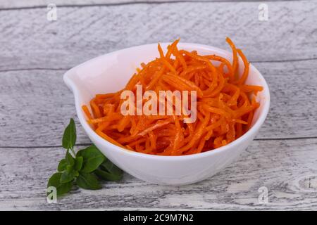 Korean cattot snack salad in the bowl served basil leaves Stock Photo ...