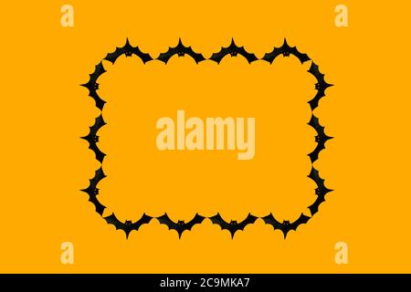 top view of paper black bats on white background with red happy ...