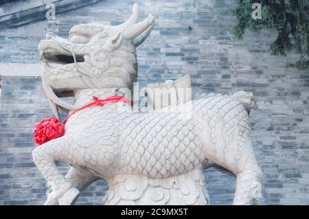 A chinese mythical creature statue called the hou or denglong at the ...