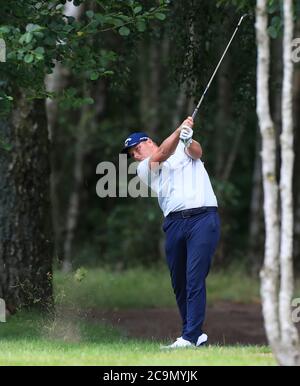 England's Callum Shinkwin plays out from the trees during day three of ...