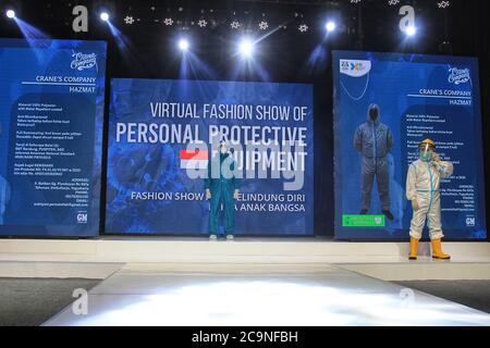 Yogyakarta, Indonesia. 01st Aug, 2020. A model walks the runway while ...
