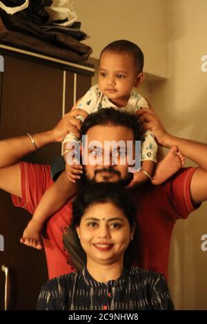Indian small family Stock Photo - Alamy