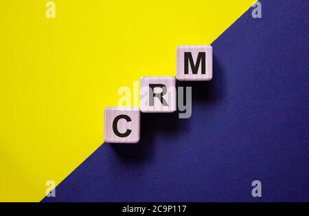 Yellow note paper with word insurance on cork board background with ...