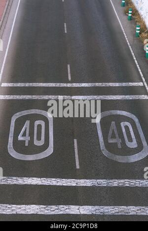 Road sign with the number 40 and the image of the children who run ...