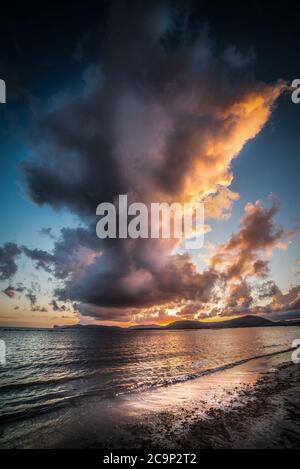 Dramatic sky over Alghero shore at sunset. Sardinia, Italy Stock Photo ...