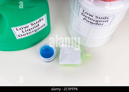 Low suds powder and liquid laundry detergent for front load washing ...