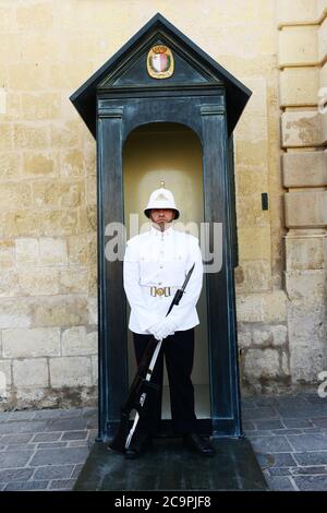 A Maltese guard at the Grandmaster palace in Valletta, Malta Stock ...