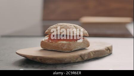 smoked salmon ciabatta with cream cheese to make a sandwich on wood ...