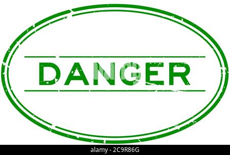 Grunge green danger word oval rubber seal stamp on white background ...