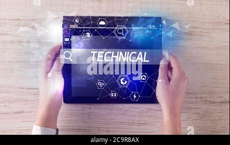 Close-up of a tablet searching TECHNICAL inscription, hi-tech computing ...