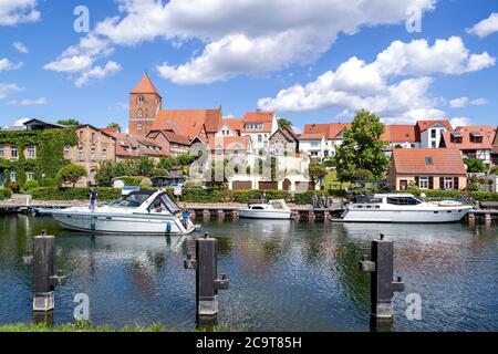 View in Plau am See in Germany across the Elde river to the St. Marien ...