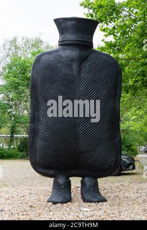 Giant hot water bottle on feet called "Big Mother" diagonal from the ...