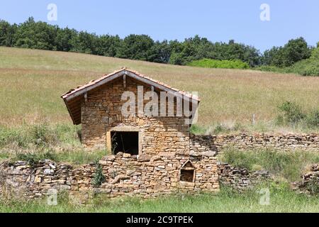 Typical stone hut called cadole in french language in Theize ...