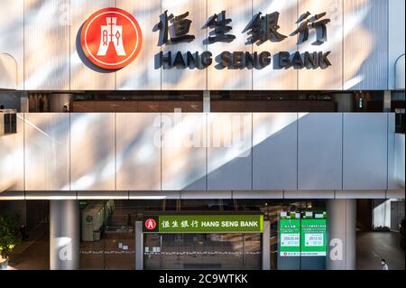 Hang Seng Bank branch and logo seen in Hong Kong. (Photo by Budrul ...