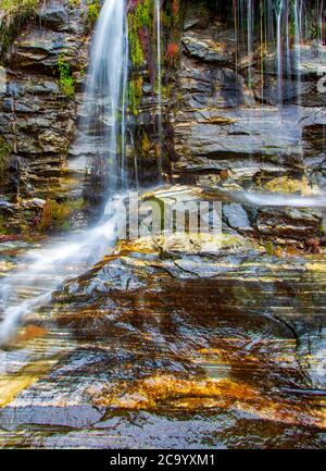 Waterfall cascading over rock layers at Watkins Glen State Park, New ...