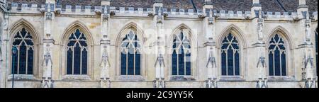 panorama of the windows of the famous Gloucester Cathedral, England ...