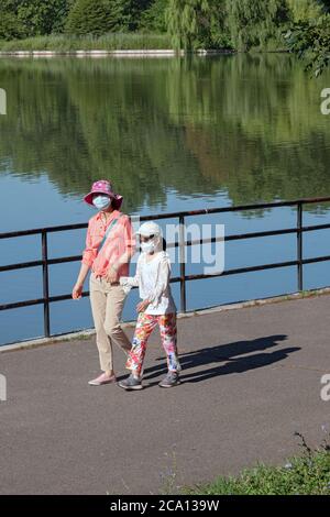 Mother and daughter are walking around the city on Christmas and New ...