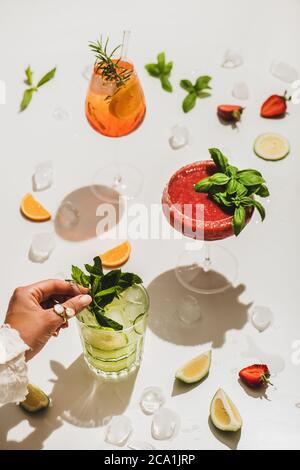 Strawberry margarita cocktails with fresh mint and whole strawberry ...