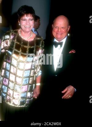 Comedian Don Rickles and his wife Barbara Rickles carry their son ...