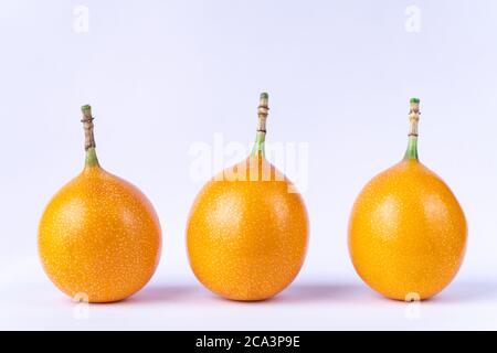 Image of ripe fresh granadilla on white background Stock Photo - Alamy