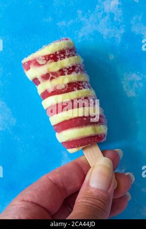 hand holding Twister mini made with fruit juice ice cream - ice cream ...