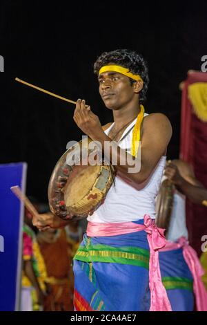 Men dance during an Indian festival dedicated to International Yoga Day ...
