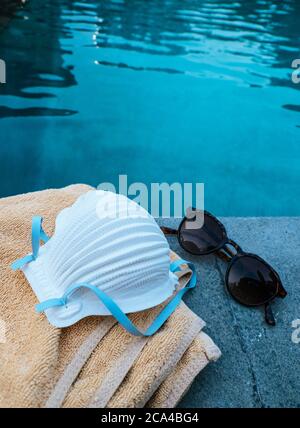 Covid 19 second wave. Covid 19. Medical mask on colors background and ...