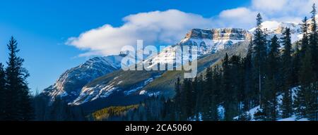 Mountains against clear sky at Jasper National Park seen through car's ...