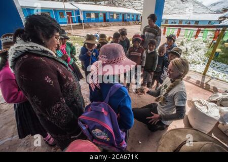 Quechua children playing outside in a small rural school in the ...