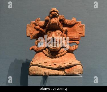 Pre-Hispanic ceramic Zapotec funerary effigy-urn of Cocijo, the god of ...
