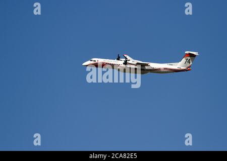 Bombardier Dash-8 firefighting aircraft during training Stock Photo - Alamy